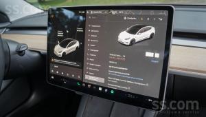 White Tesla Model 3 2021 in Riga, with an engine capacity of 0.00 L and mileage of 126 thousand km for 27450 €, photo 22 on AUTOMOTO.COM.LV