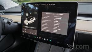 White Tesla Model 3 2021 in Riga, with an engine capacity of 0.00 L and mileage of 126 thousand km for 27450 €, photo 23 on AUTOMOTO.COM.LV