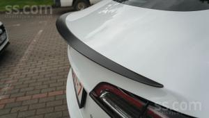 White Tesla Model 3 2021 in Riga, with an engine capacity of 0.00 L and mileage of 126 thousand km for 27450 €, photo 26 on AUTOMOTO.COM.LV