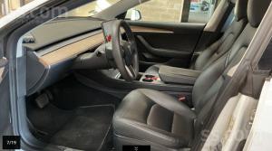 White Tesla Model 3 2021 in Riga, with an engine capacity of 0.00 L and mileage of 132 thousand km for 21950 €, photo 6 on AUTOMOTO.COM.LV