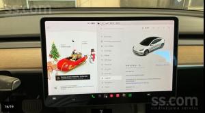 White Tesla Model 3 2021 in Riga, with an engine capacity of 0.00 L and mileage of 132 thousand km for 21950 €, photo 8 on AUTOMOTO.COM.LV