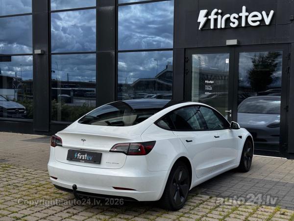 White Tesla Model 3 2021 in Tallinn, with an engine capacity of 0.00 L and mileage of 73 thousand km for 29990 €, photo 5 on AUTOMOTO.COM.LV