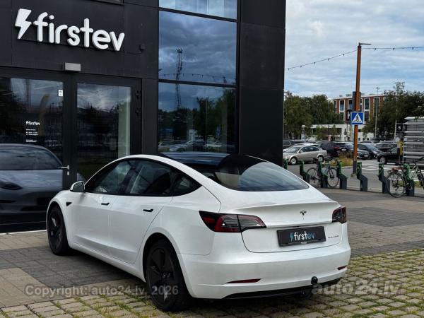 White Tesla Model 3 2021 in Tallinn, with an engine capacity of 0.00 L and mileage of 73 thousand km for 29990 €, photo 7 on AUTOMOTO.COM.LV