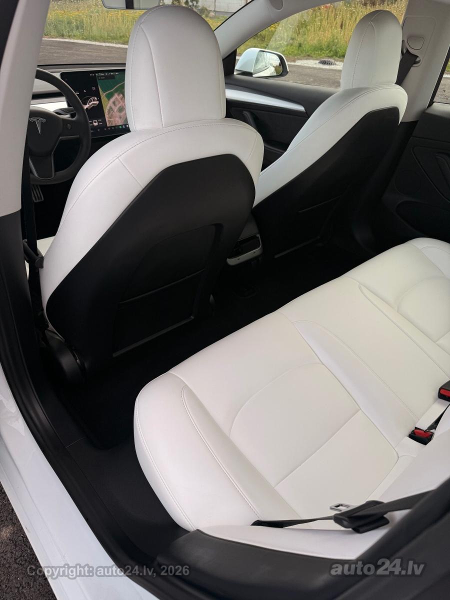 White Tesla Model 3 2021 in Tallinn, with an engine capacity of 0.00 L and mileage of 101 thousand km for 29400 €, photo 15 on AUTOMOTO.COM.LV