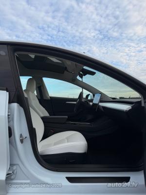 White Tesla Model 3 2021 in Tallinn, with an engine capacity of 0.00 L and mileage of 101 thousand km for 29400 €, photo 24 on AUTOMOTO.COM.LV