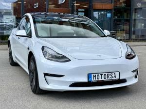 White Tesla Model 3 2021 in Kaunas, with an engine capacity of 0.00 L and mileage of 29 thousand km for 21490 €, photo 4 on AUTOMOTO.COM.LV