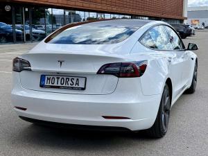 White Tesla Model 3 2021 in Kaunas, with an engine capacity of 0.00 L and mileage of 29 thousand km for 21490 €, photo 6 on AUTOMOTO.COM.LV
