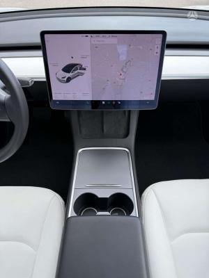 White Tesla Model 3 2021 in Kaunas, with an engine capacity of 0.00 L and mileage of 29 thousand km for 21490 €, photo 17 on AUTOMOTO.COM.LV