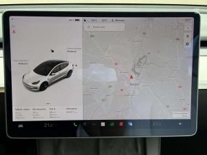 White Tesla Model 3 2021 in Kaunas, with an engine capacity of 0.00 L and mileage of 29 thousand km for 21490 €, photo 18 on AUTOMOTO.COM.LV