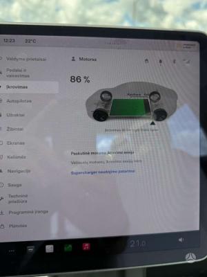 White Tesla Model 3 2021 in Kaunas, with an engine capacity of 0.00 L and mileage of 29 thousand km for 21490 €, photo 20 on AUTOMOTO.COM.LV