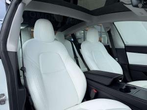 White Tesla Model 3 2021 in Kaunas, with an engine capacity of 0.00 L and mileage of 29 thousand km for 21490 €, photo 24 on AUTOMOTO.COM.LV