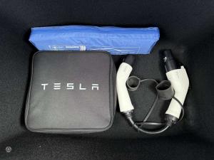 White Tesla Model 3 2021 in Kaunas, with an engine capacity of 0.00 L and mileage of 29 thousand km for 21490 €, photo 28 on AUTOMOTO.COM.LV