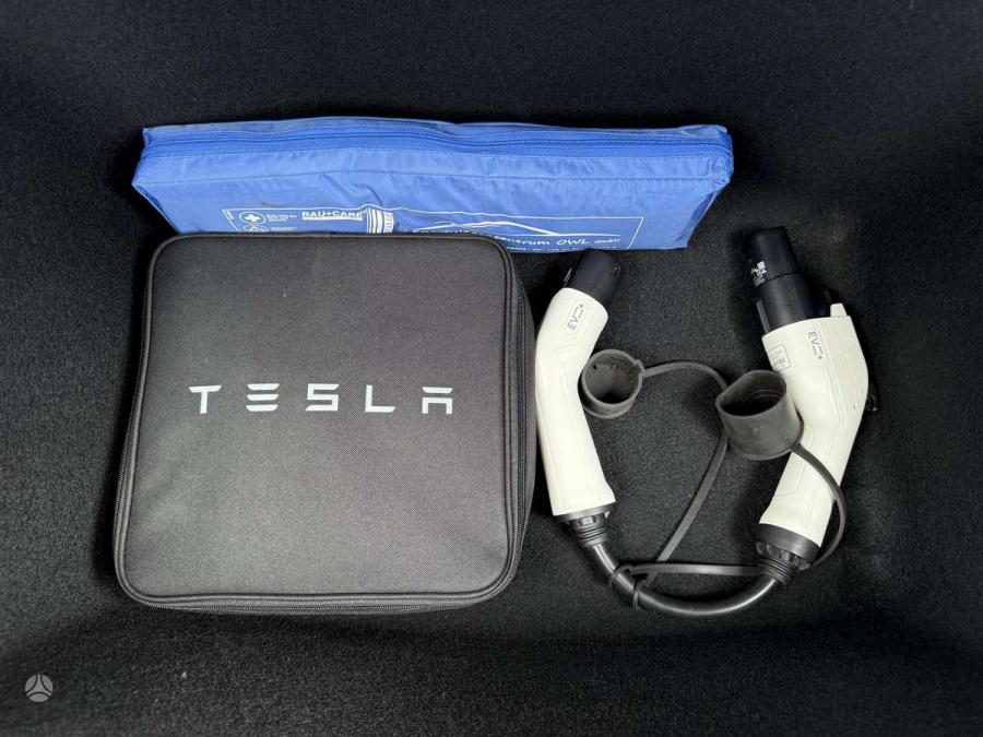 White Tesla Model 3 2021 in Kaunas, with an engine capacity of 0.00 L and mileage of 29 thousand km for 21490 €, photo 28 on AUTOMOTO.COM.LV