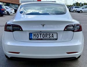 White Tesla Model 3 2021 in Kaunas, with an engine capacity of 0.00 L and mileage of 29 thousand km for 21490 €, photo 32 on AUTOMOTO.COM.LV