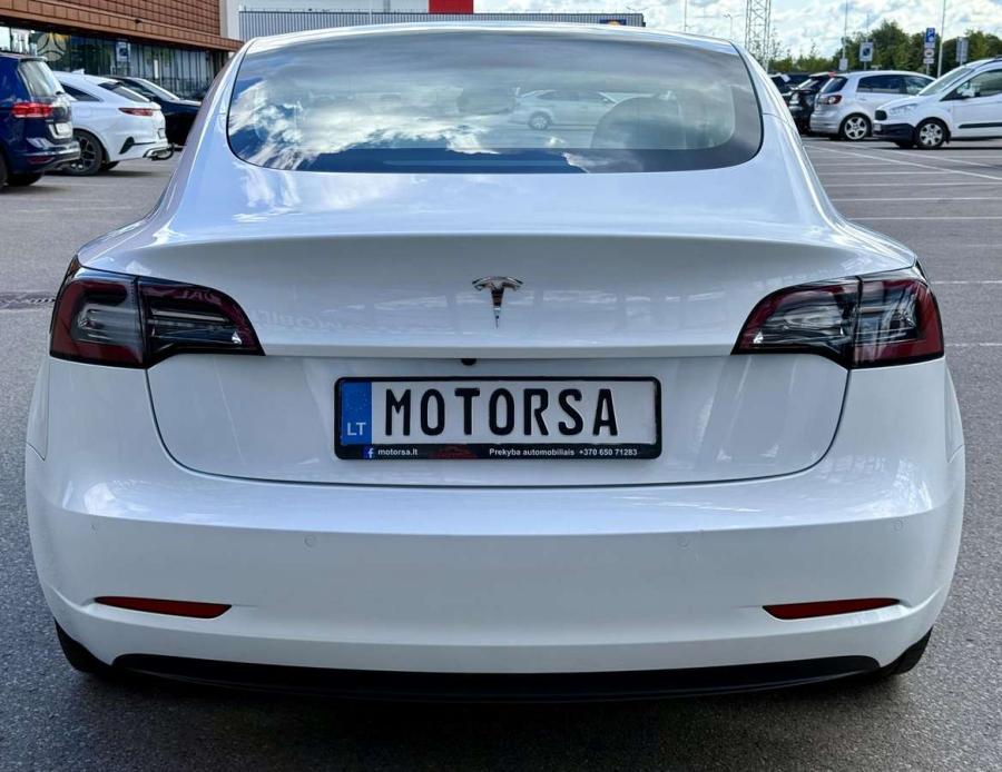 White Tesla Model 3 2021 in Kaunas, with an engine capacity of 0.00 L and mileage of 29 thousand km for 21490 €, photo 32 on AUTOMOTO.COM.LV