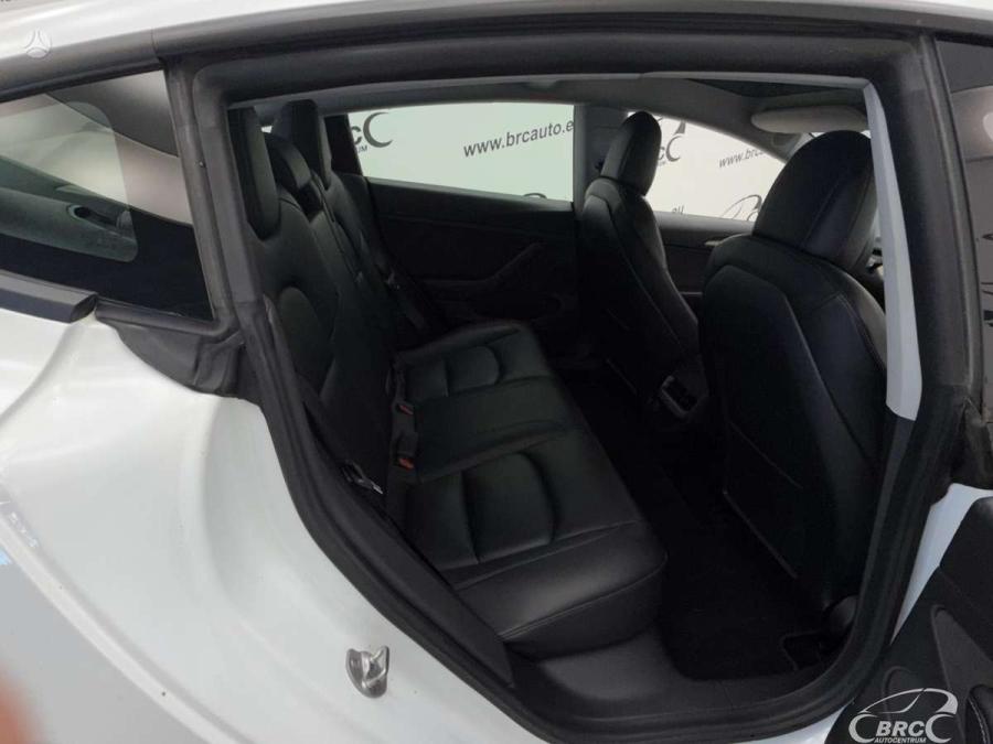 White Tesla Model 3 2021 in Vilnius, with an engine capacity of 0.00 L and mileage of 106 thousand km for 23500 €, photo 13 on AUTOMOTO.COM.LV