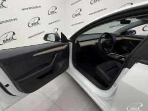 White Tesla Model 3 2021 in Vilnius, with an engine capacity of 0.00 L and mileage of 106 thousand km for 23500 €, photo 20 on AUTOMOTO.COM.LV