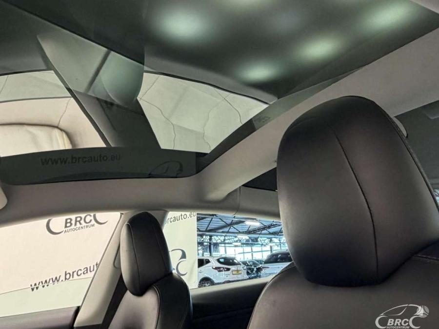 White Tesla Model 3 2021 in Vilnius, with an engine capacity of 0.00 L and mileage of 106 thousand km for 23500 €, photo 25 on AUTOMOTO.COM.LV
