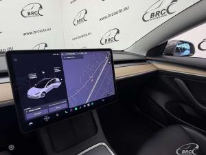 White Tesla Model 3 2021 in Vilnius, with an engine capacity of 0.00 L and mileage of 106 thousand km for 23500 €, photo 26 on AUTOMOTO.COM.LV