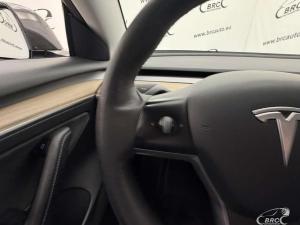 White Tesla Model 3 2021 in Vilnius, with an engine capacity of 0.00 L and mileage of 106 thousand km for 23500 €, photo 29 on AUTOMOTO.COM.LV