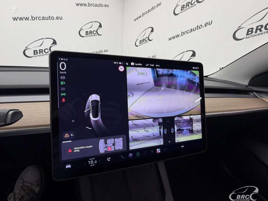 White Tesla Model 3 2021 in Vilnius, with an engine capacity of 0.00 L and mileage of 106 thousand km for 23500 €, photo 31 on AUTOMOTO.COM.LV