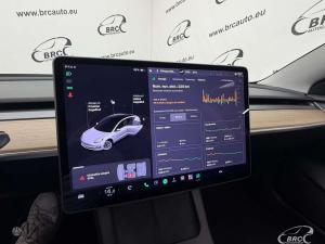 White Tesla Model 3 2021 in Vilnius, with an engine capacity of 0.00 L and mileage of 106 thousand km for 23500 €, photo 32 on AUTOMOTO.COM.LV