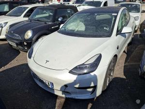 White Tesla Model 3 2021 in Panevezys, with an engine capacity of 0.00 L and mileage of 89 thousand km for 9000 €, photo 4 on AUTOMOTO.COM.LV