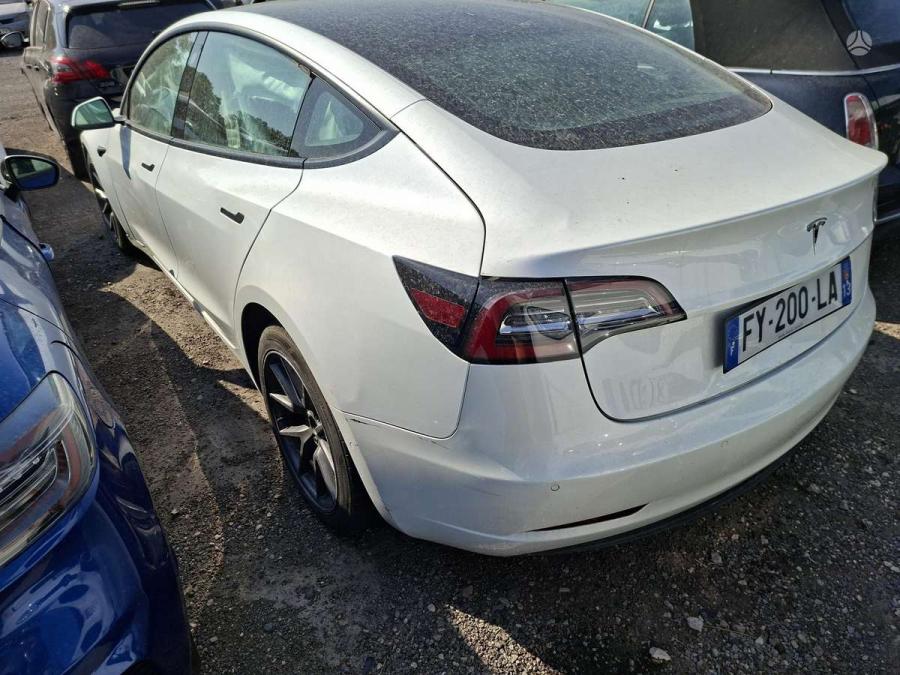 White Tesla Model 3 2021 in Panevezys, with an engine capacity of 0.00 L and mileage of 89 thousand km for 9000 €, photo 5 on AUTOMOTO.COM.LV