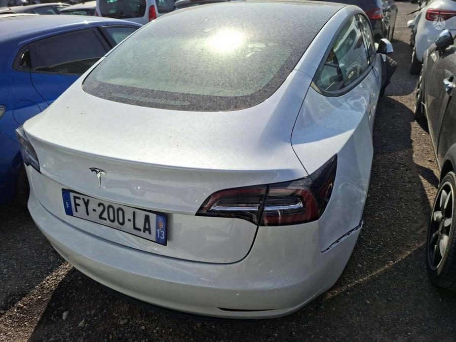 White Tesla Model 3 2021 in Panevezys, with an engine capacity of 0.00 L and mileage of 89 thousand km for 9000 €, photo 6 on AUTOMOTO.COM.LV