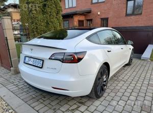 White Tesla Model 3 2021 in Riga, with an engine capacity of 0.00 L and mileage of 58 thousand km for 28500 €, photo  on AUTOMOTO.COM.LV