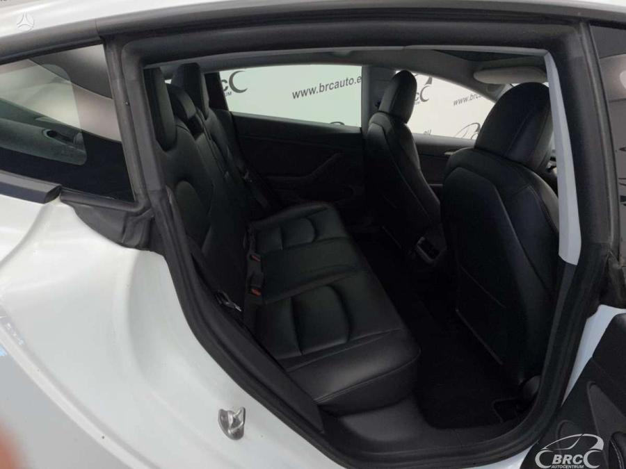 White Tesla Model 3 2021 in Vilnius, with an engine capacity of 0.00 L and mileage of 106 thousand km for 23200 €, photo 13 on AUTOMOTO.COM.LV