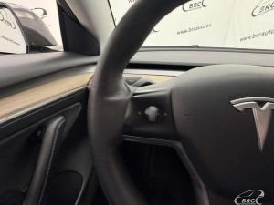 White Tesla Model 3 2021 in Vilnius, with an engine capacity of 0.00 L and mileage of 106 thousand km for 23200 €, photo 29 on AUTOMOTO.COM.LV