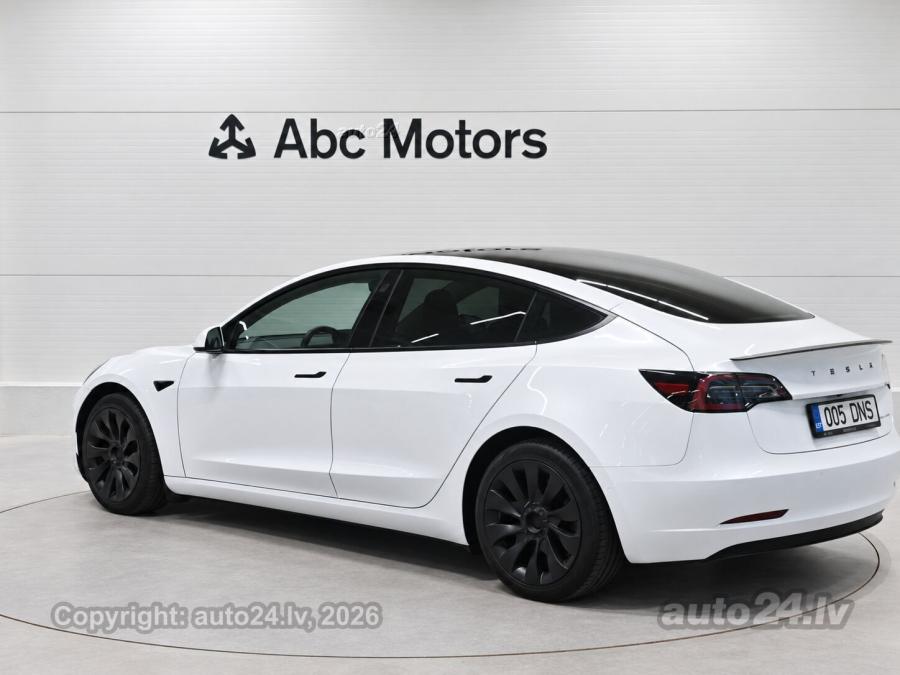 White Tesla Model 3 2021 in Tallinn, with an engine capacity of 0.00 L and mileage of 78 thousand km for 30990 €, photo 5 on AUTOMOTO.COM.LV