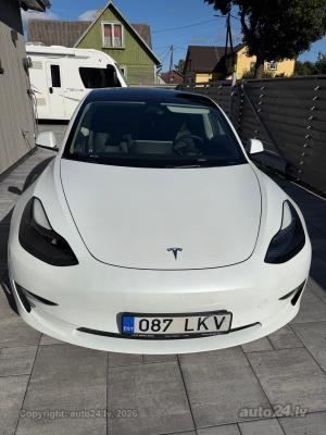 White Tesla Model 3 2021 in Tallinn, with an engine capacity of 0.00 L and mileage of 72 thousand km for 28900 €, photo 4 on AUTOMOTO.COM.LV