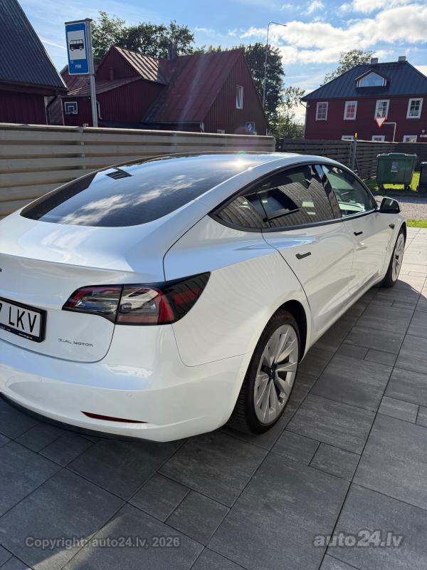 White Tesla Model 3 2021 in Tallinn, with an engine capacity of 0.00 L and mileage of 72 thousand km for 28900 €, photo 5 on AUTOMOTO.COM.LV