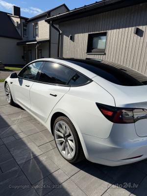 White Tesla Model 3 2021 in Tallinn, with an engine capacity of 0.00 L and mileage of 72 thousand km for 28900 €, photo 6 on AUTOMOTO.COM.LV