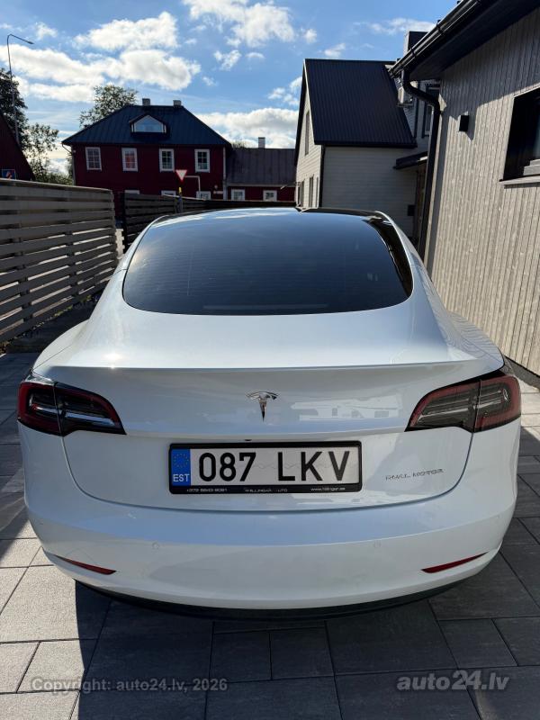 White Tesla Model 3 2021 in Tallinn, with an engine capacity of 0.00 L and mileage of 72 thousand km for 28900 €, photo 7 on AUTOMOTO.COM.LV