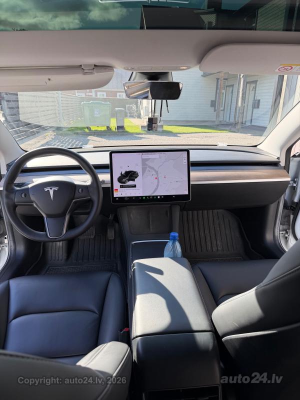 White Tesla Model 3 2021 in Tallinn, with an engine capacity of 0.00 L and mileage of 72 thousand km for 28900 €, photo 8 on AUTOMOTO.COM.LV