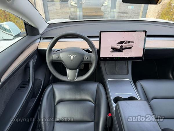 White Tesla Model 3 2022 in Tallinn, with an engine capacity of 0.00 L and mileage of 79 thousand km for 29990 €, photo 4 on AUTOMOTO.COM.LV