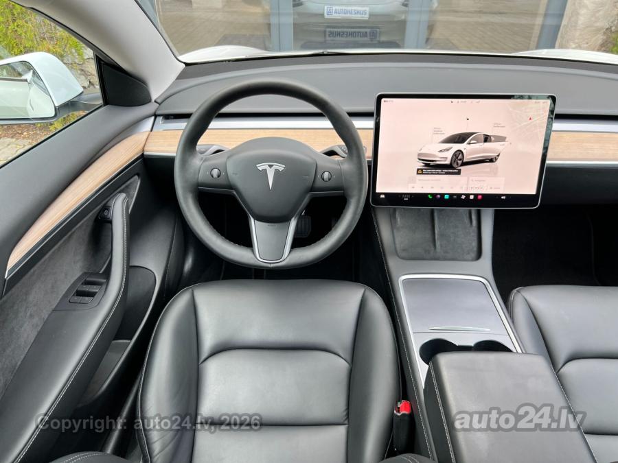 White Tesla Model 3 2022 in Tallinn, with an engine capacity of 0.00 L and mileage of 61 thousand km for 32990 €, photo 5 on AUTOMOTO.COM.LV