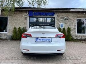 White Tesla Model 3 2022 in Tallinn, with an engine capacity of 0.00 L and mileage of 61 thousand km for 32990 €, photo 12 on AUTOMOTO.COM.LV