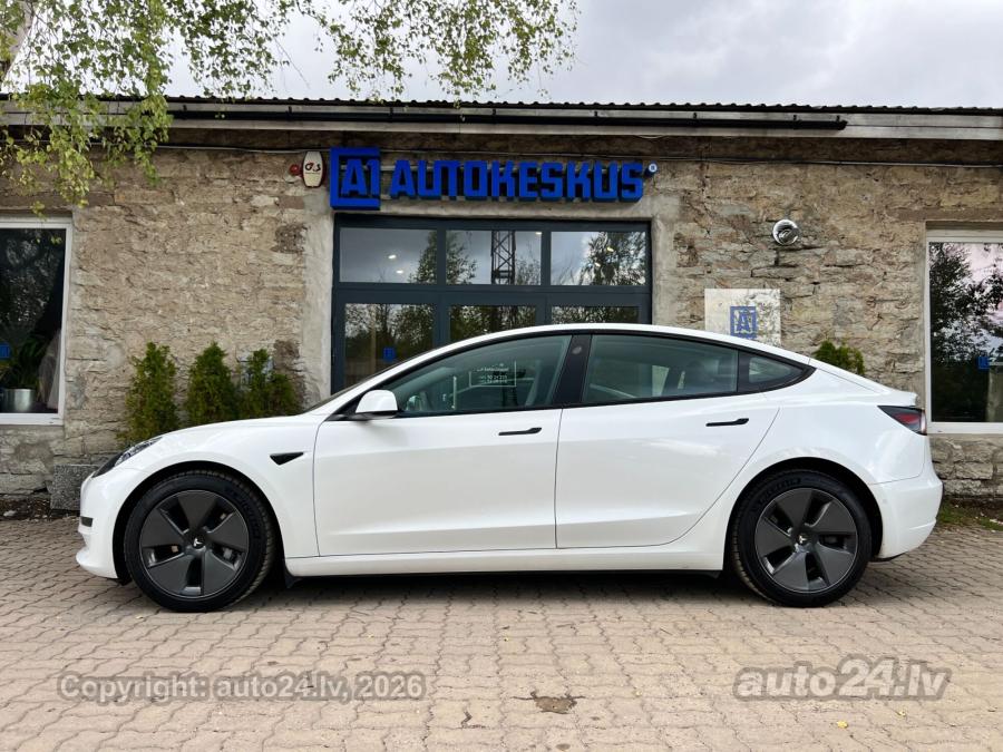 White Tesla Model 3 2022 in Tallinn, with an engine capacity of 0.00 L and mileage of 61 thousand km for 32990 €, photo 14 on AUTOMOTO.COM.LV