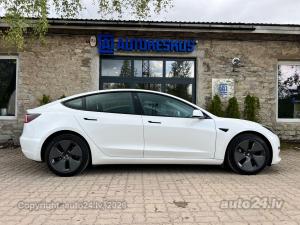 White Tesla Model 3 2022 in Tallinn, with an engine capacity of 0.00 L and mileage of 61 thousand km for 32990 €, photo 15 on AUTOMOTO.COM.LV