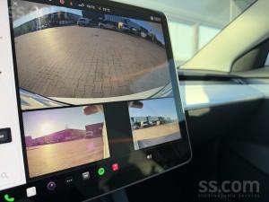 White Tesla Model 3 2022 in Riga, with an engine capacity of 0.00 L and mileage of 39 thousand km for 32400 €, photo 12 on AUTOMOTO.COM.LV