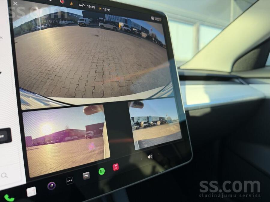 White Tesla Model 3 2022 in Riga, with an engine capacity of 0.00 L and mileage of 39 thousand km for 32400 €, photo 12 on AUTOMOTO.COM.LV