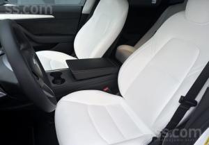 White Tesla Model 3 2022 in Riga, with an engine capacity of 0.00 L and mileage of 39 thousand km for 32400 €, photo 15 on AUTOMOTO.COM.LV