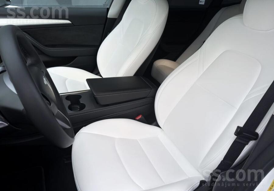 White Tesla Model 3 2022 in Riga, with an engine capacity of 0.00 L and mileage of 39 thousand km for 32400 €, photo 15 on AUTOMOTO.COM.LV