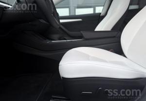 White Tesla Model 3 2022 in Riga, with an engine capacity of 0.00 L and mileage of 39 thousand km for 32400 €, photo 16 on AUTOMOTO.COM.LV