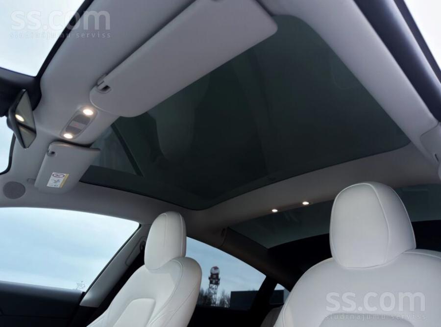 White Tesla Model 3 2022 in Riga, with an engine capacity of 0.00 L and mileage of 39 thousand km for 32400 €, photo 17 on AUTOMOTO.COM.LV