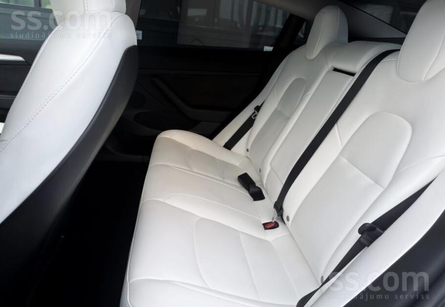 White Tesla Model 3 2022 in Riga, with an engine capacity of 0.00 L and mileage of 39 thousand km for 32400 €, photo 19 on AUTOMOTO.COM.LV